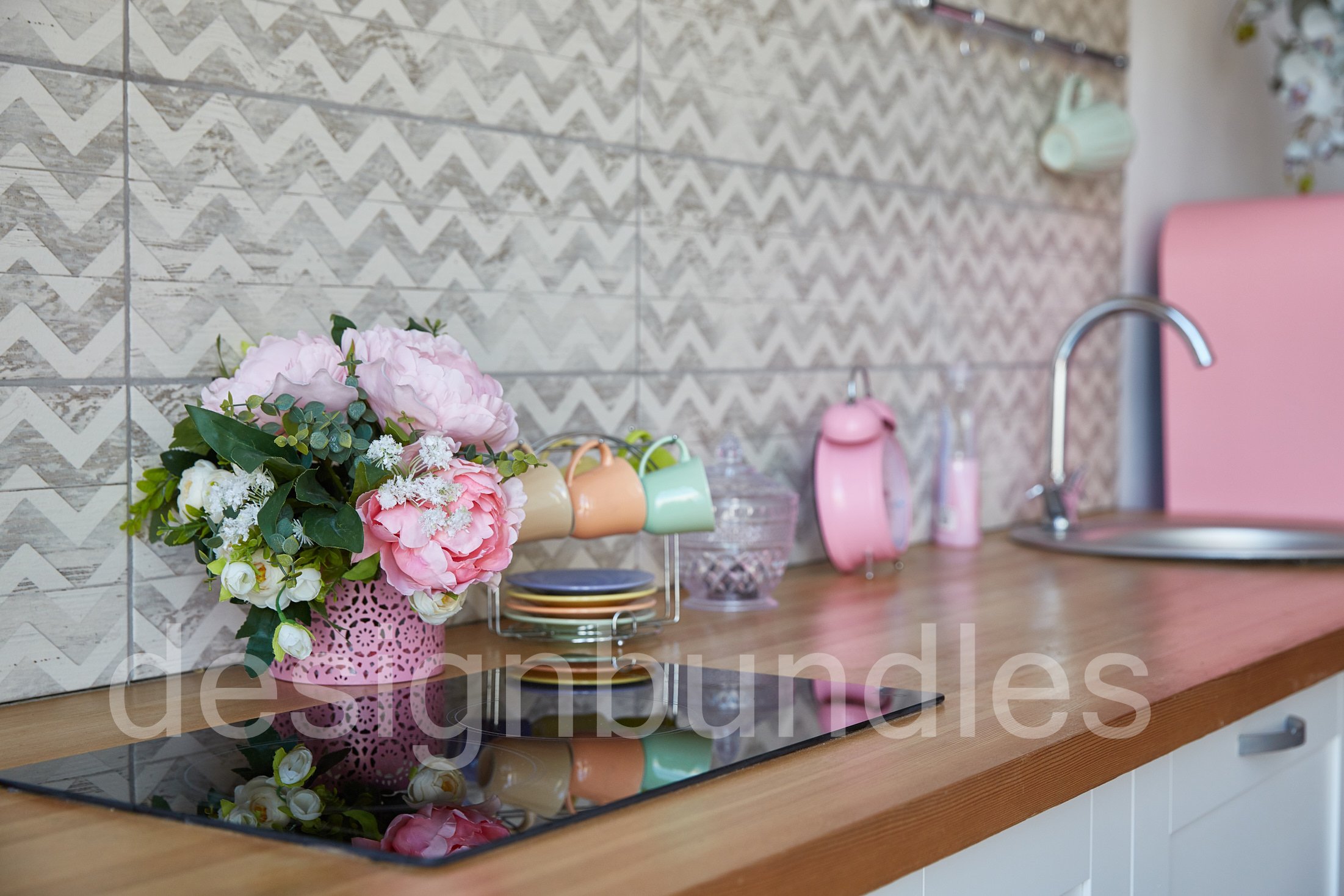 Interior of a modern kitchen set with a bouquet of flowers (596739 ...