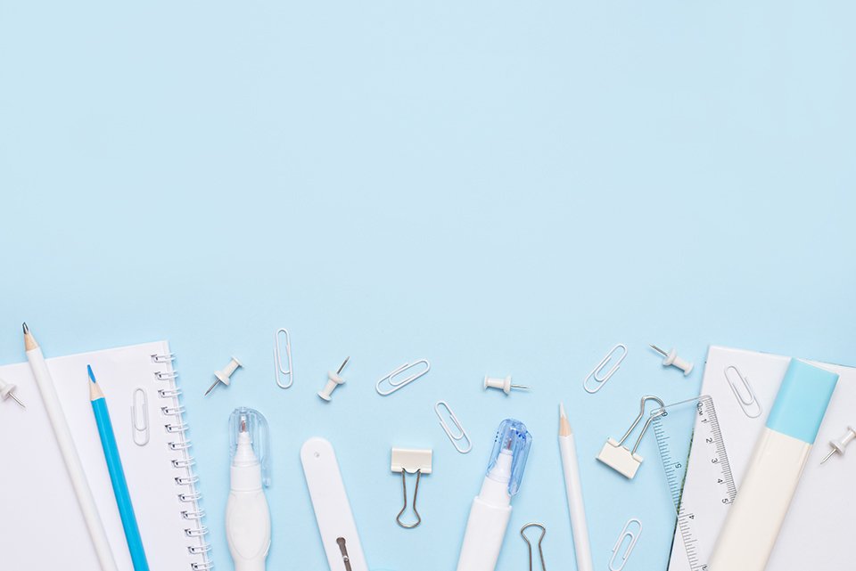 School supplies of blue and white colors on a blue backgroun (669451 ...