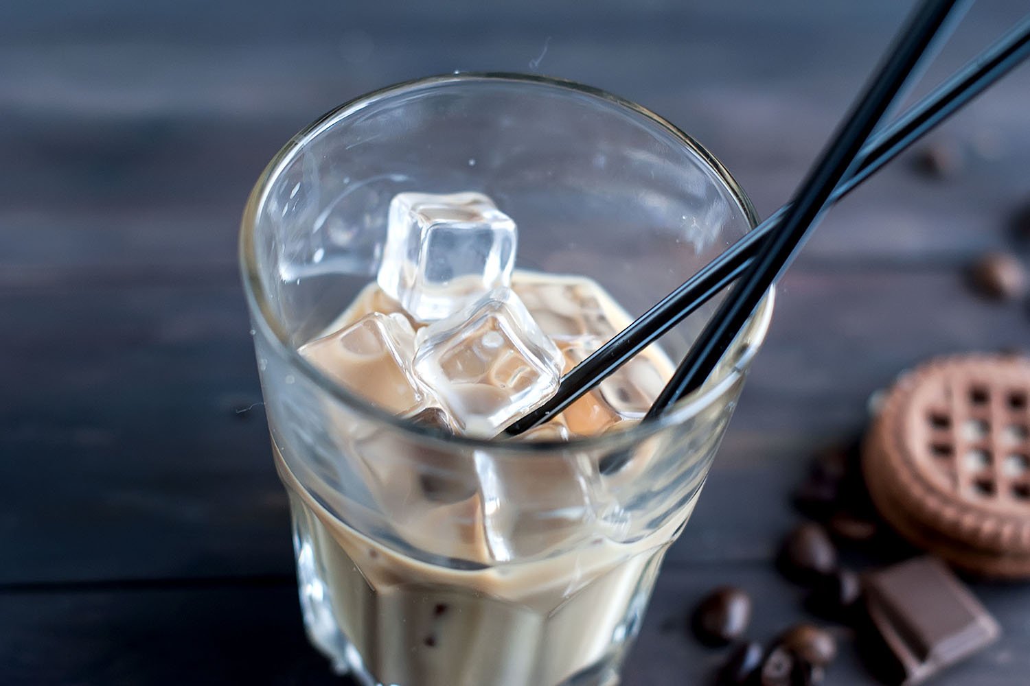 Iced coffee with milk in glass (589848) | Food and Drink | Design Bundles