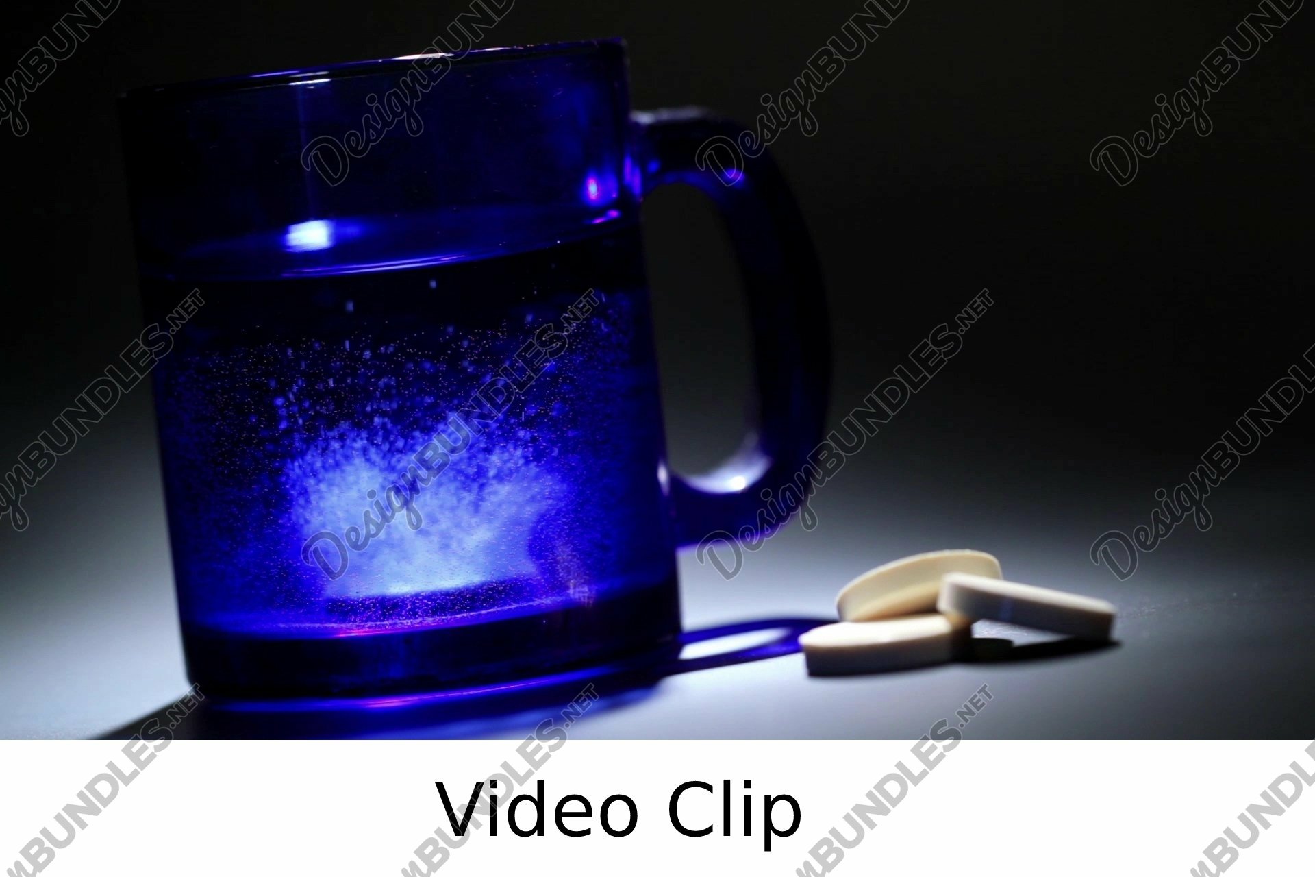 Video: Tablet dissolving in a blue glass of water (1393074) | People ...