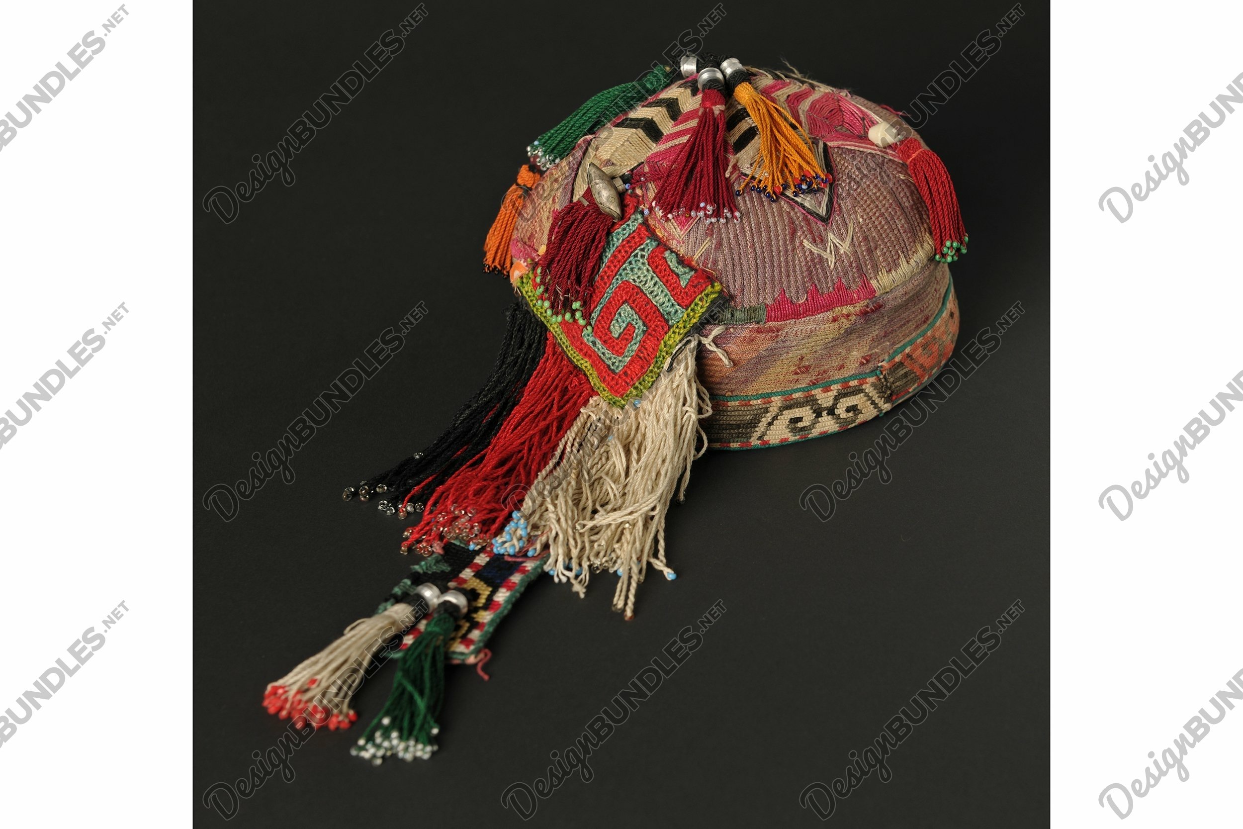 Colorful traditional asian skullcap cap on a dark background (1221804 ...