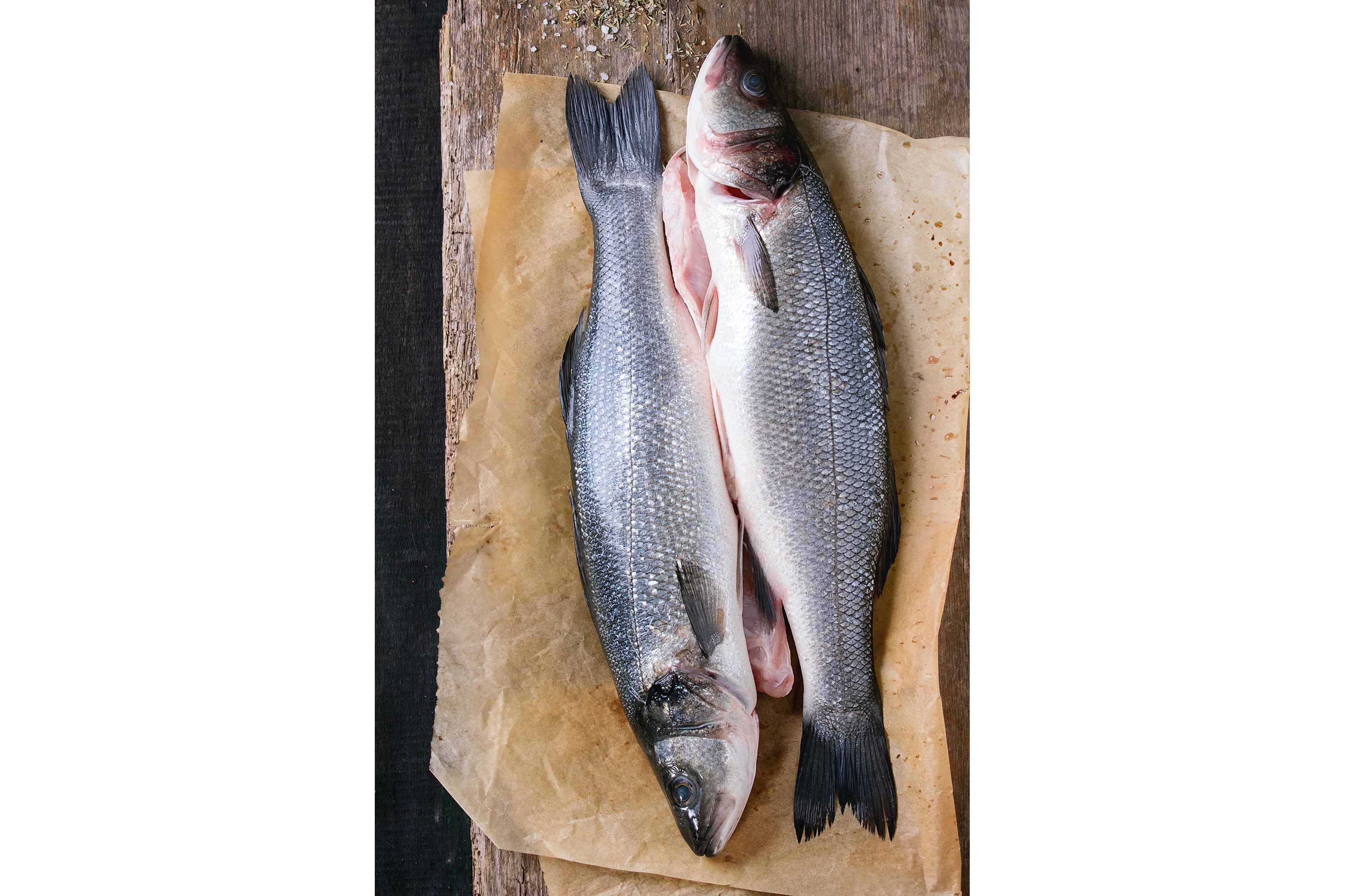 Raw seebass fish (596828) | Food and Drink | Design Bundles