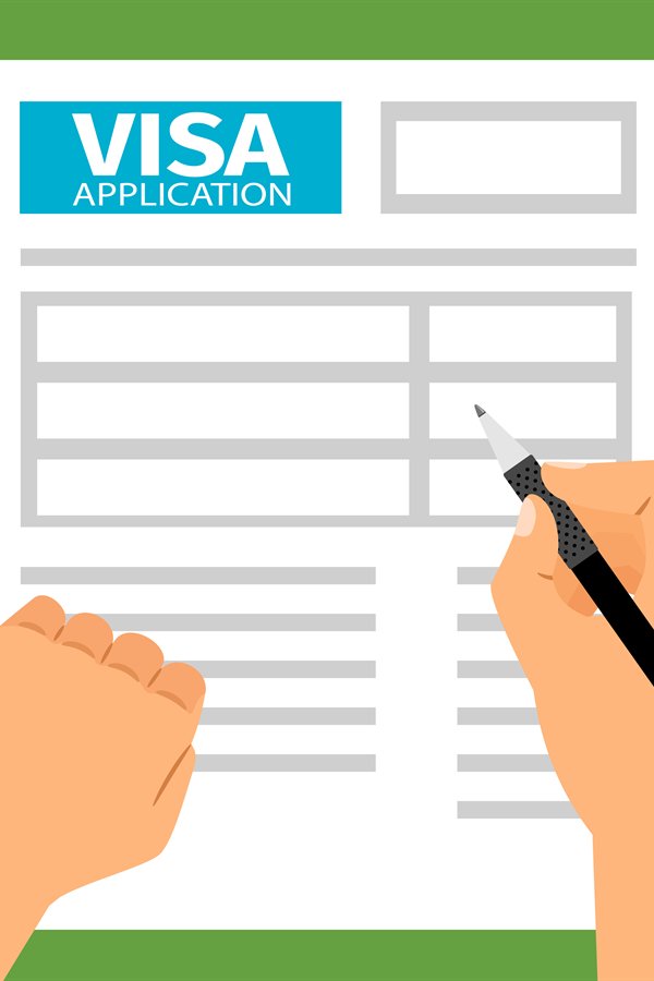 Man hands filling out visa application