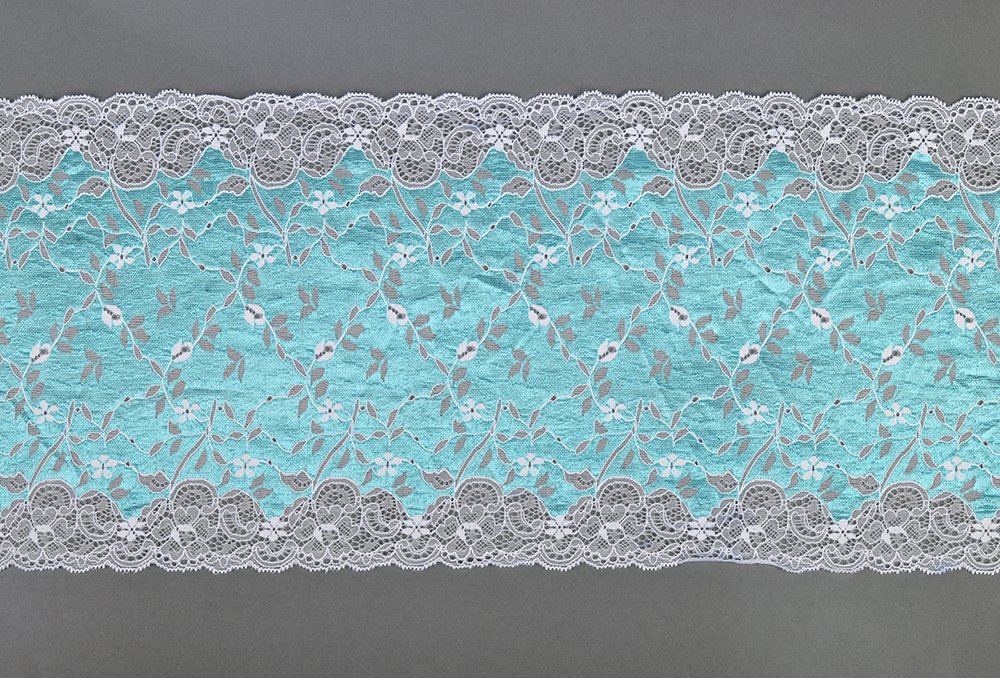 Blue straight strip of lace fabric. Texture for (1216987)