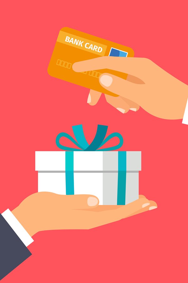 Hands holding credit card and present