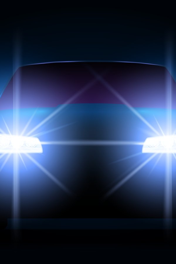 Car lights. Night urban scene with automobile or vehicle sil