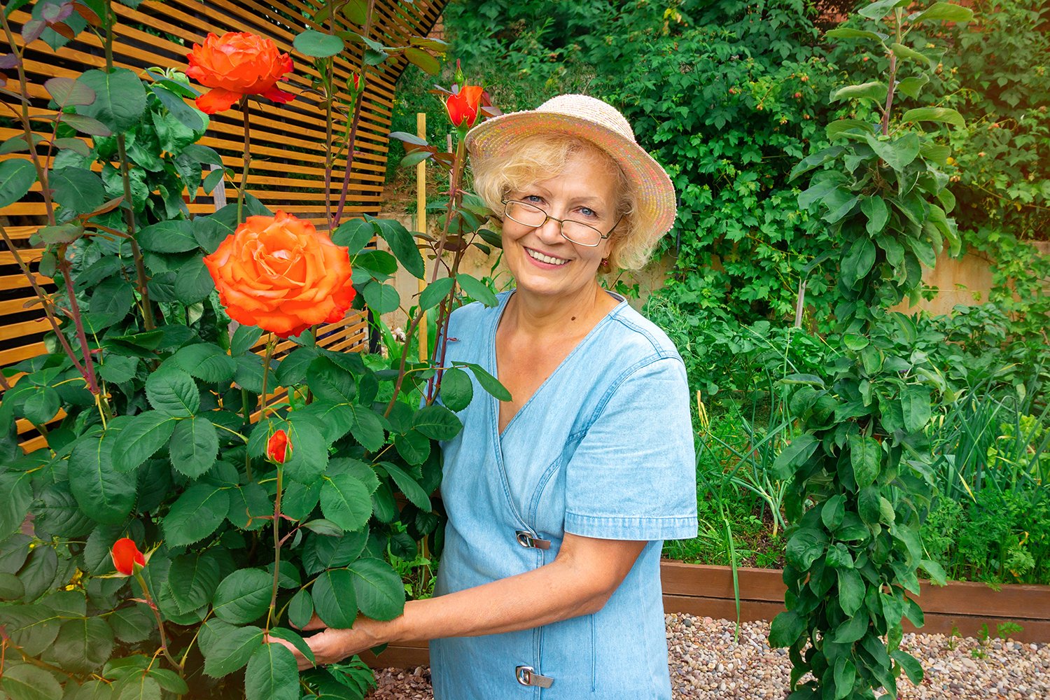Portrait of a woman gardener on a summer day
