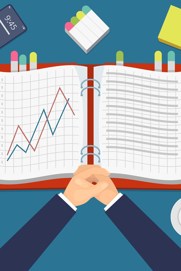 Financial performance. Work diary with graphs top view, inve