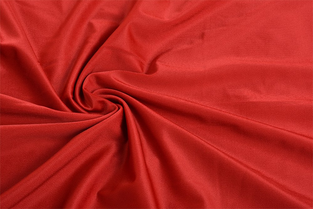 Abstract backdrop of Red texture curl fabric. (1104995)