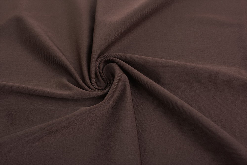 Abstract backdrop of Brown texture curl fabric. (1104935)