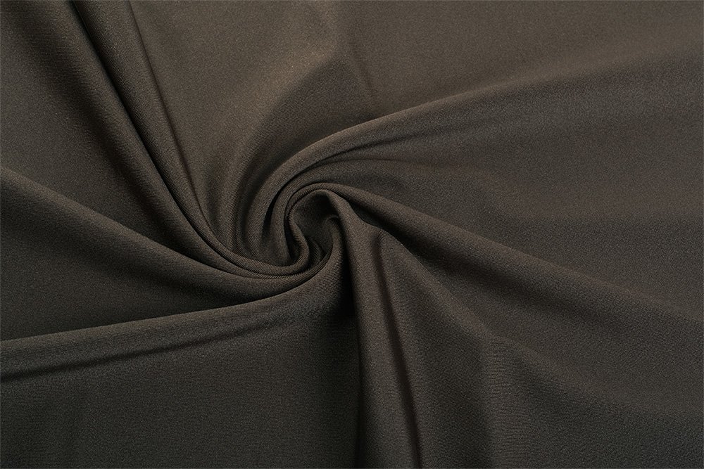 Abstract backdrop of Khaki texture curl fabric. (1104946)