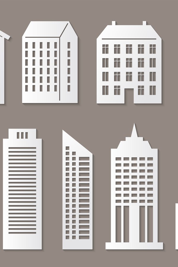 Paper buildings. Origami houses with shadows white (1334018)