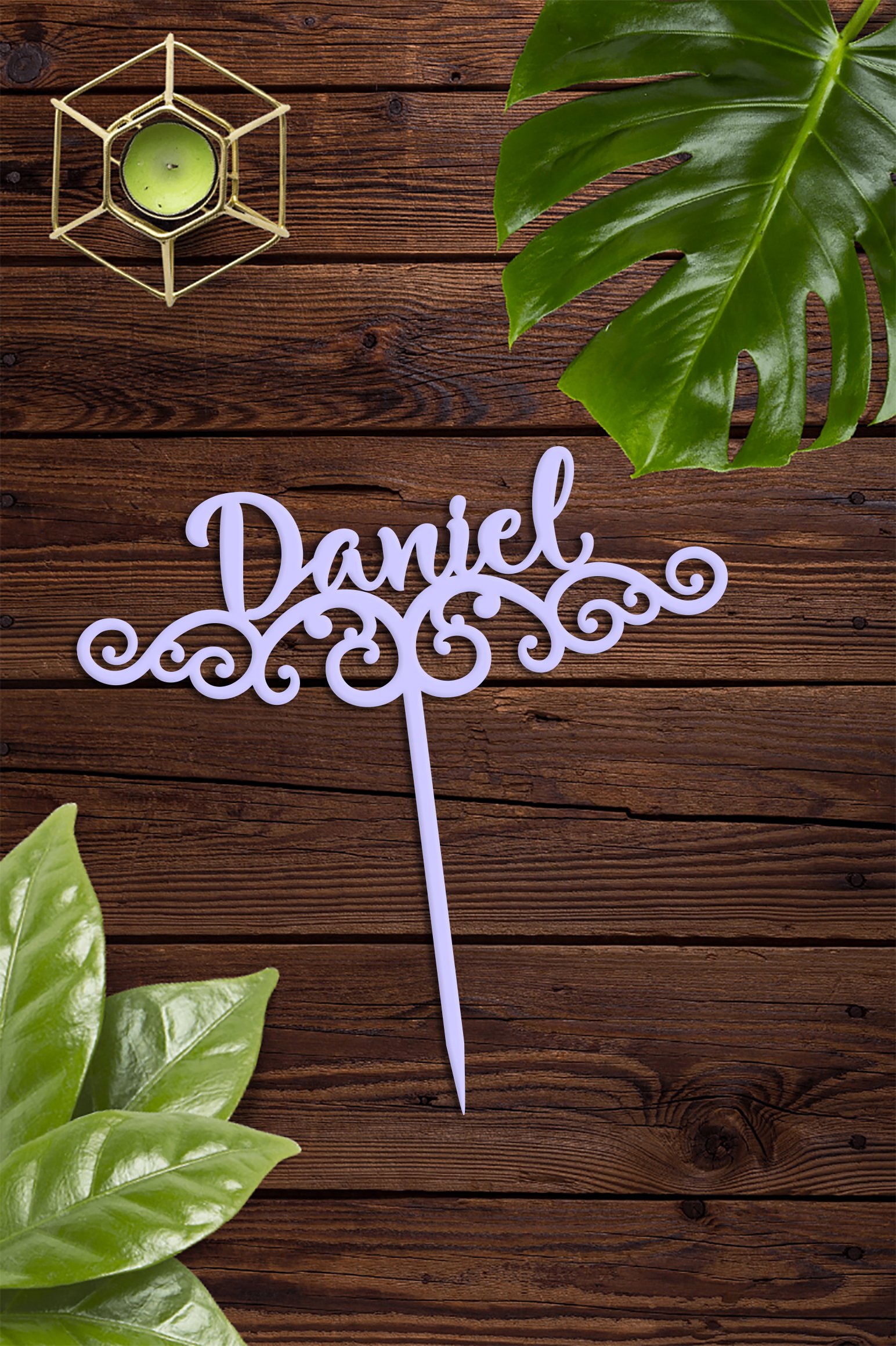 Daniel. Name topper for a birthday cake. Laser cutting.