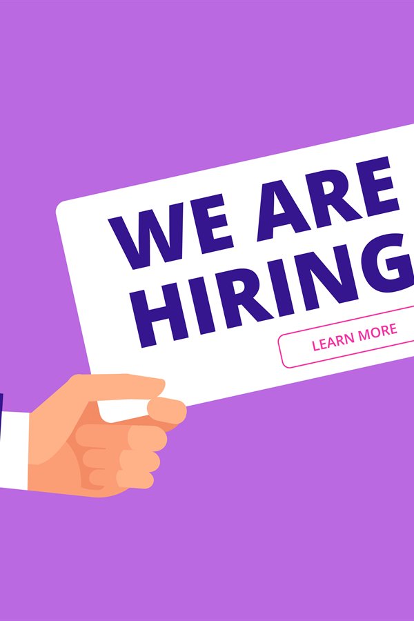 Hiring concept. Hand holding banner with we are hiring text