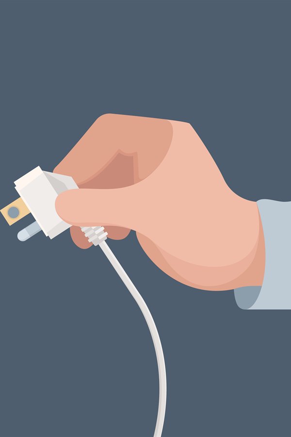 Electric plug in hand. Safety home energy home electric appl