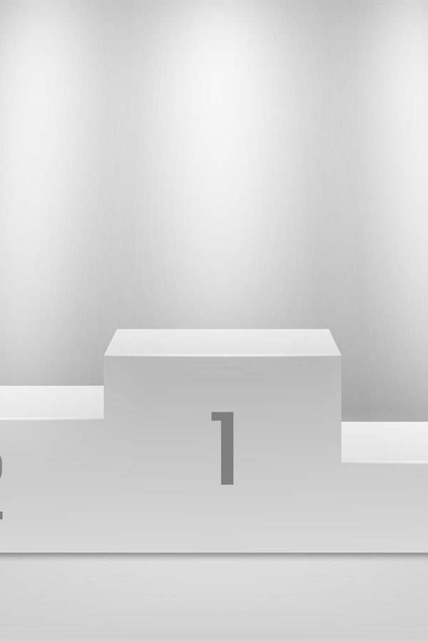 Sports podium. Empty white winners pedestal with spotlights.