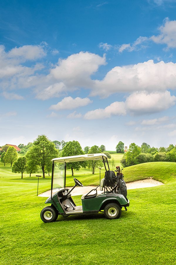 Golf cart green grass field. Golf club
