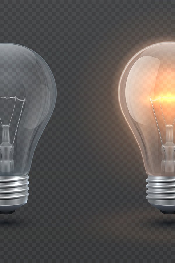 Realistic glowing electric light bulb isolated on transparen