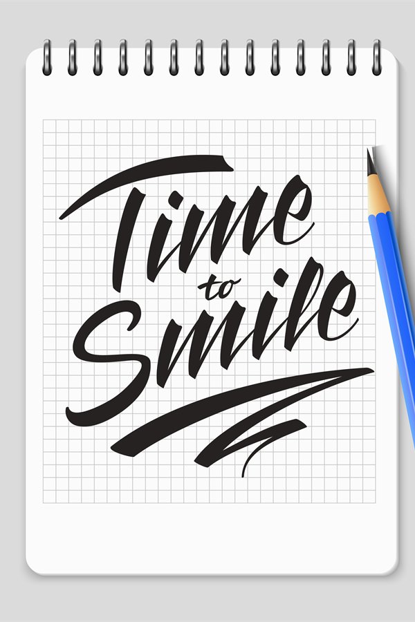 Time to smile vector lettering on realistic notebook page