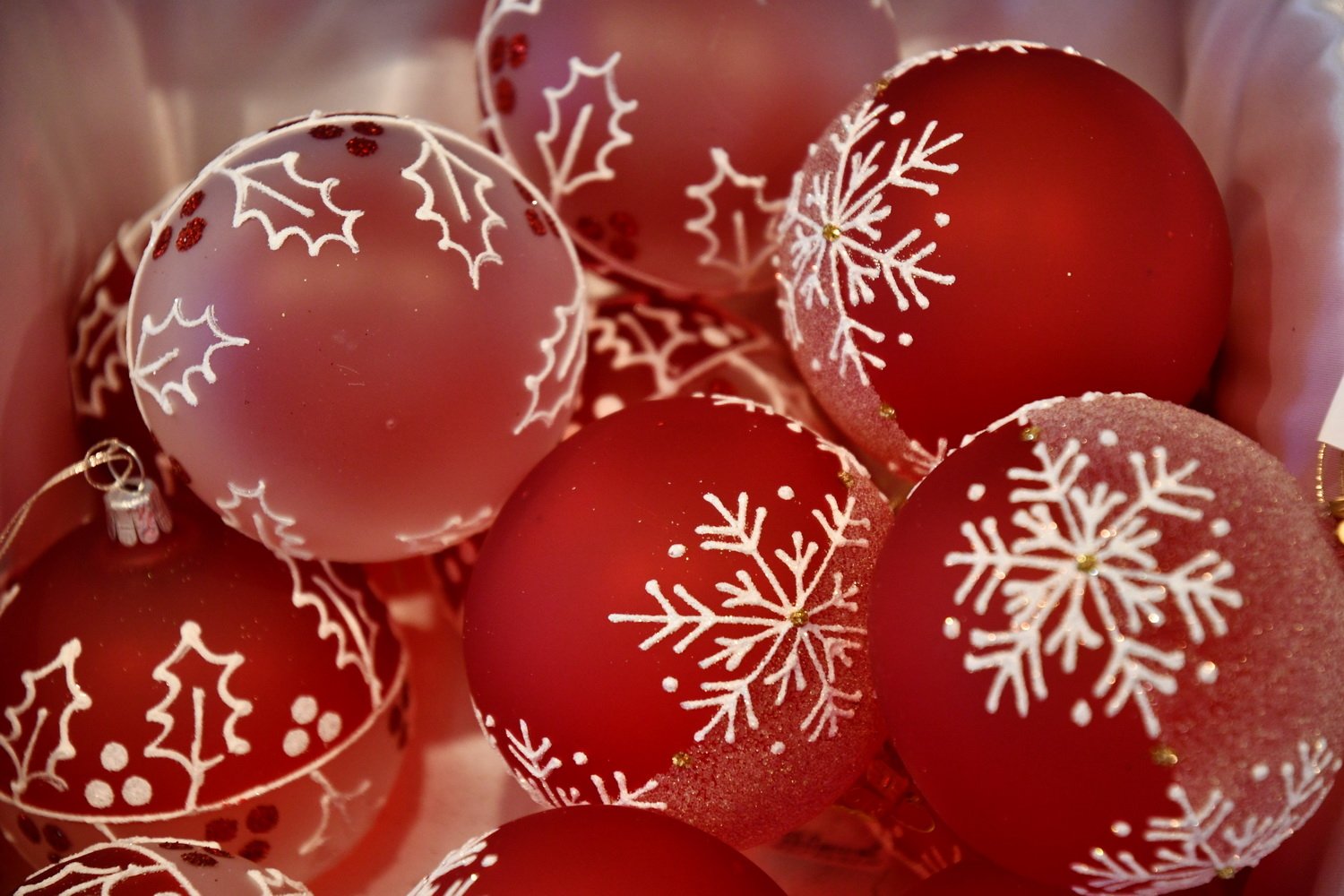 Holiday background of red Christmas ornaments