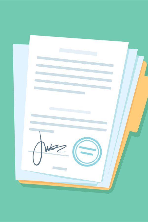 Signed paper documents. Manual signature on important office