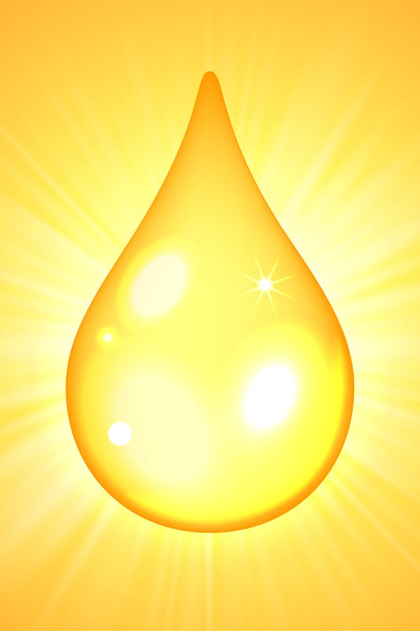 Oil drop on yellow sunburst background