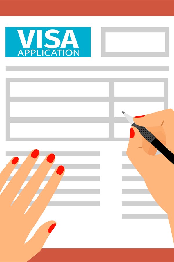 Woman hands filling out visa application
