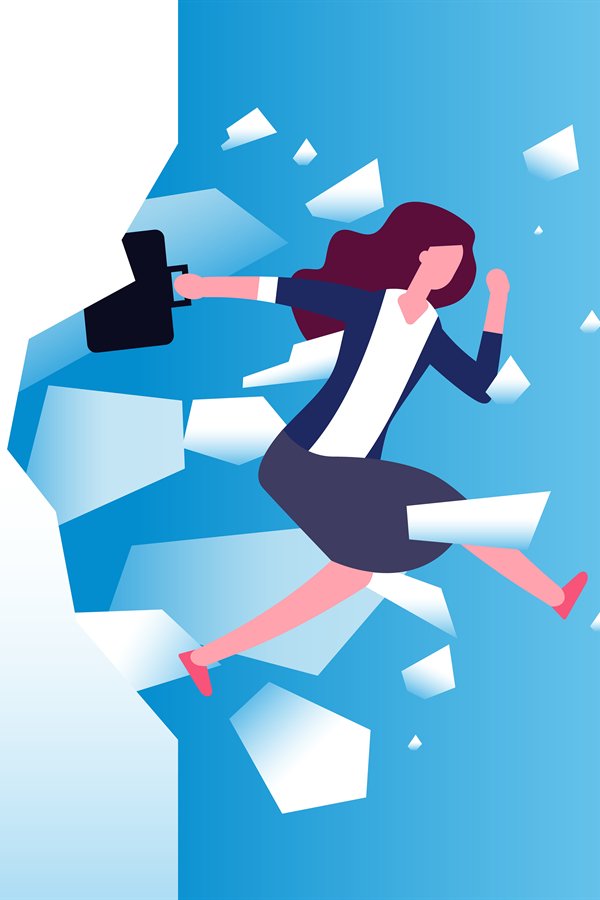 Businesswoman breaking wall. Strong woman jamps through barr