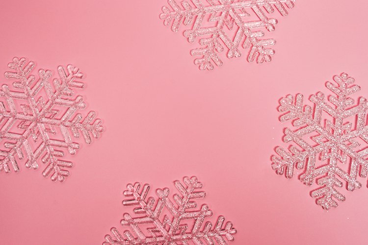 Pink Christmas frame with crystal snowflakes. New year