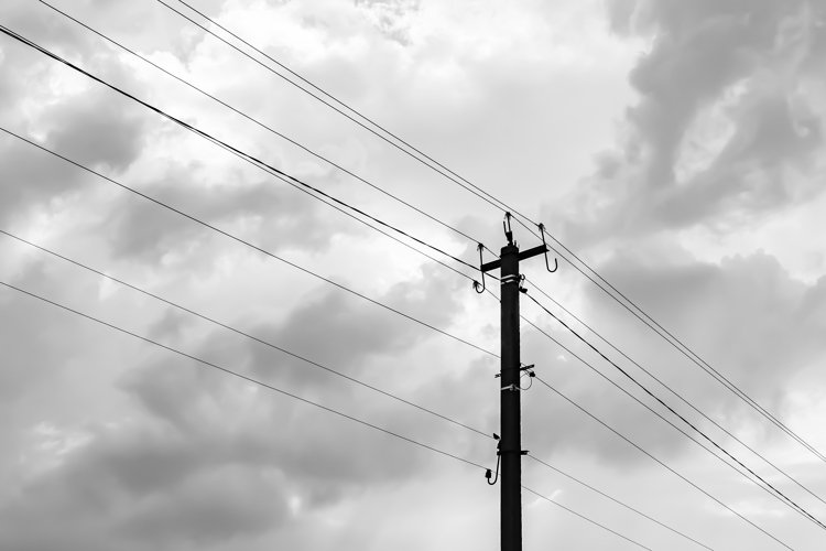 Power electric pole with line wire on coloured background