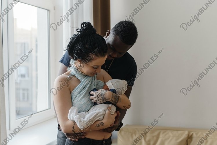 Caring for a mestizo baby. Multinational family