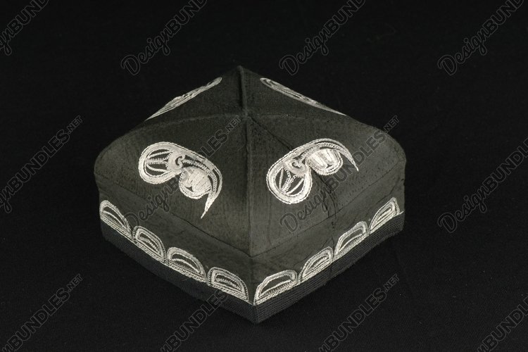 Traditional asian skullcap cap on a dark (1221821)