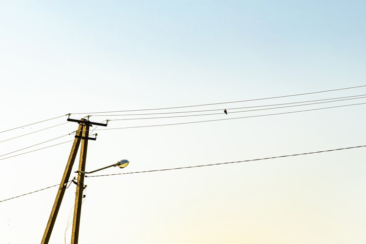Power electric pole with line wire on coloured background