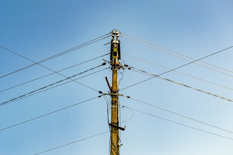 Power electric pole with line wire on coloured background