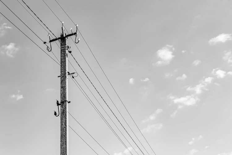 Power electric pole with line wire on coloured background