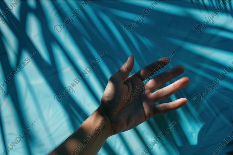 Hand reaching with shadow patterns