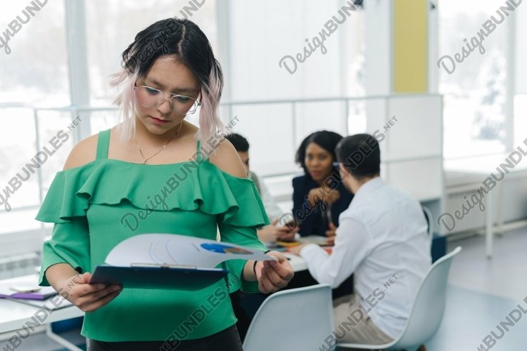 Portrait of a young female student in the classroom