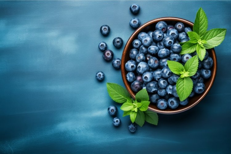 Tasty fresh bilberries with green leaves in ceramic bowl. Ge