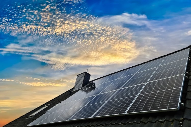 Solar panels on the roof of a house during sunset (2465686)