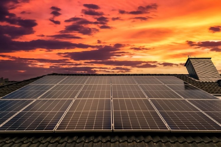 Solar panels on the roof of a house during sunset (2465687)