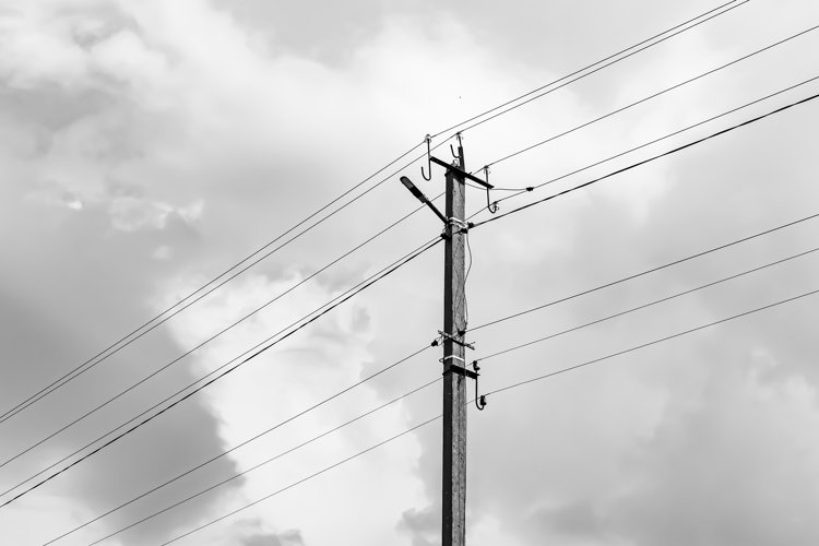 Power electric pole with line wire on coloured background