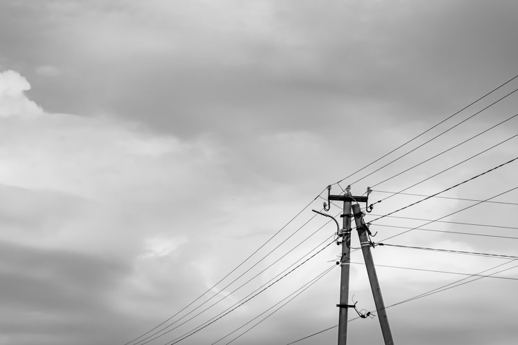 Power electric pole with line wire on coloured background