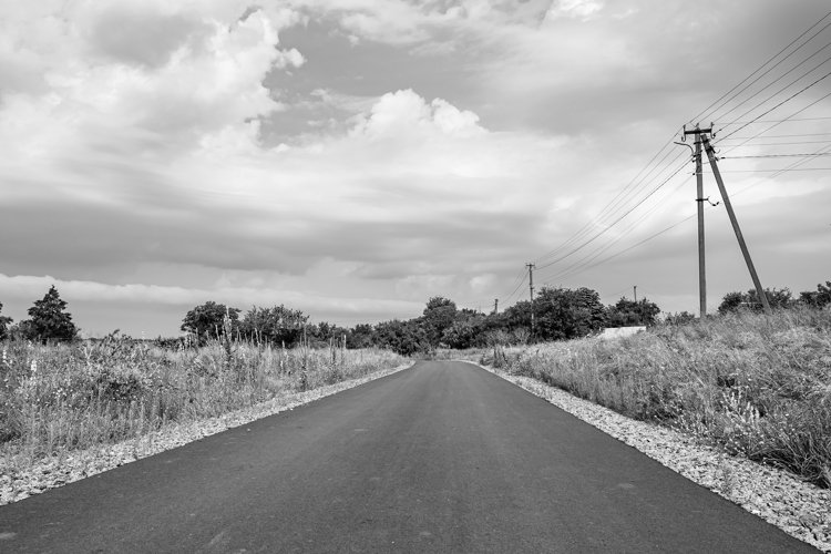 Beautiful empty asphalt road in countryside on background