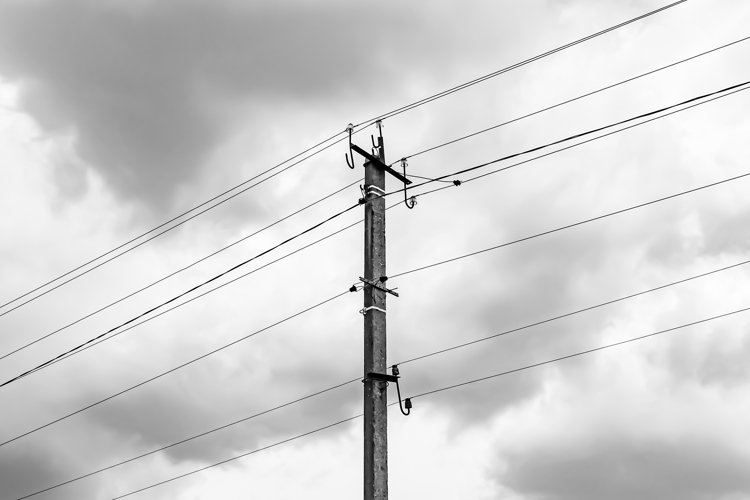 Power electric pole with line wire on coloured background