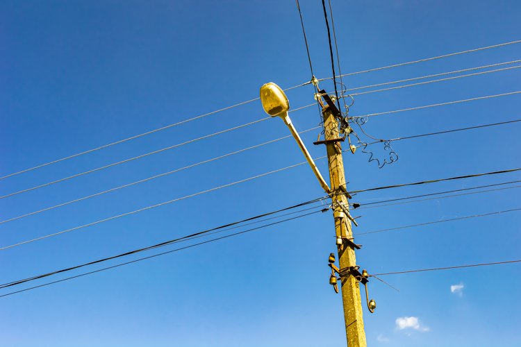 Power electric pole with line wire on coloured background