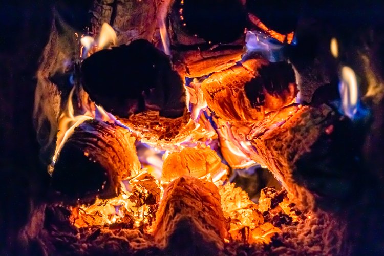 Fireplace with light flame fire for heating building room