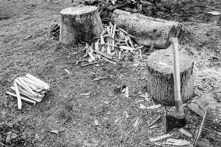 Photography on theme big steel axe with wooden handle