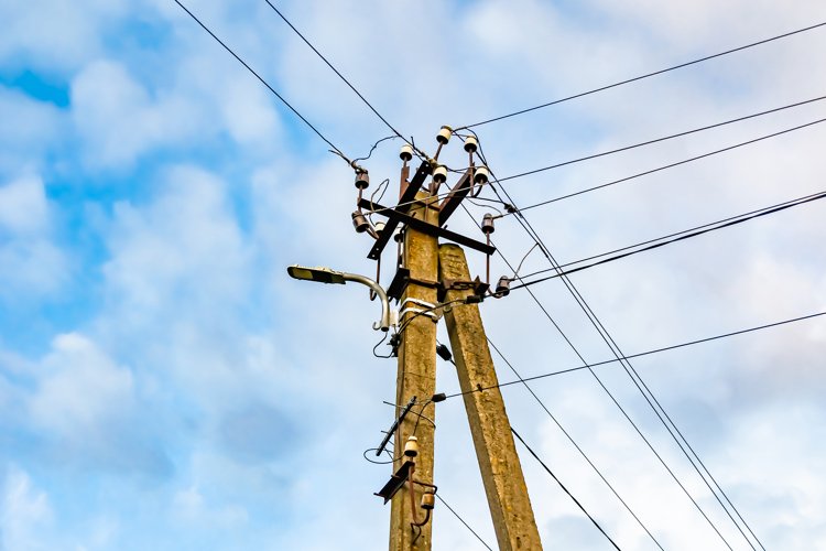 Power electric pole with line wire on coloured background