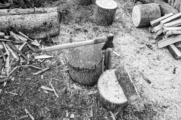 Photography on theme big steel axe with wooden handle