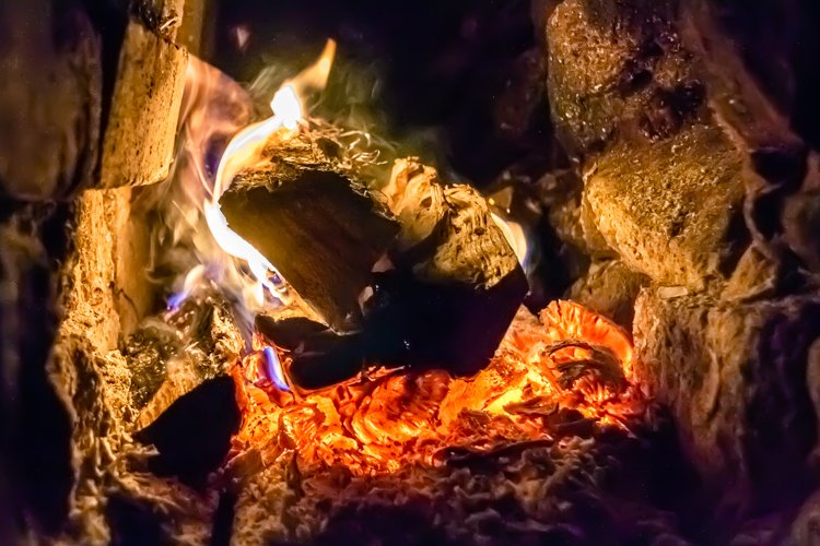 Fireplace with light flame fire for heating building room